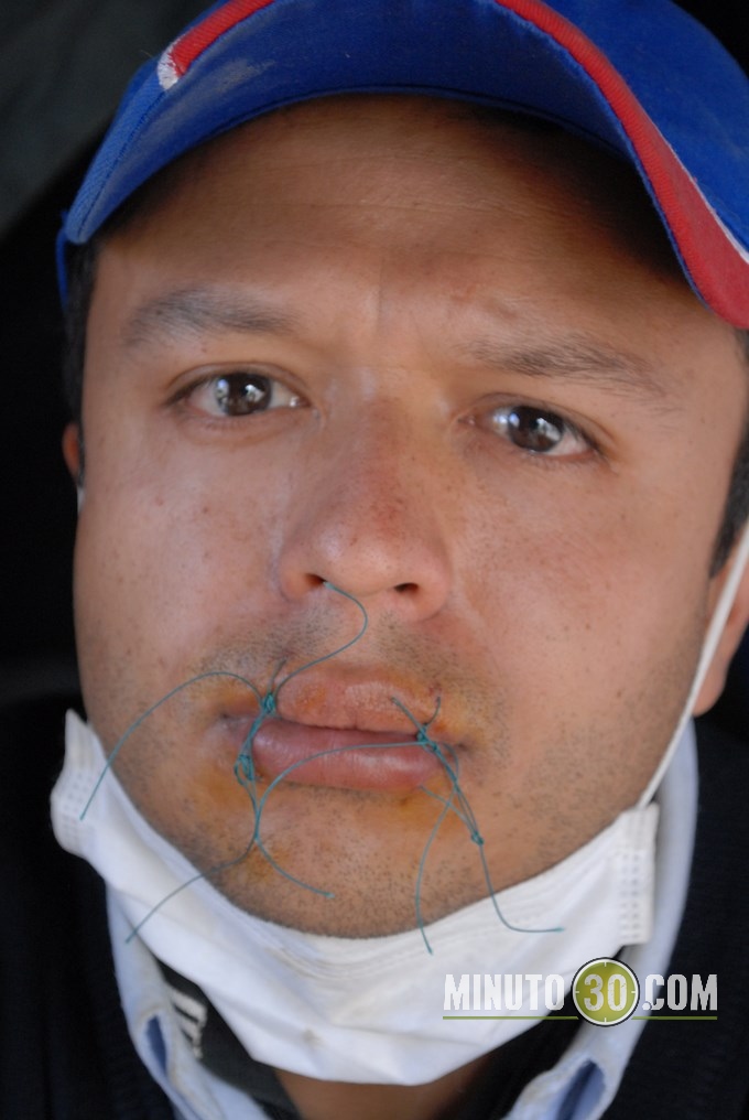 Enterrados y con la boca cosida protestaron empleados de General Motors ...